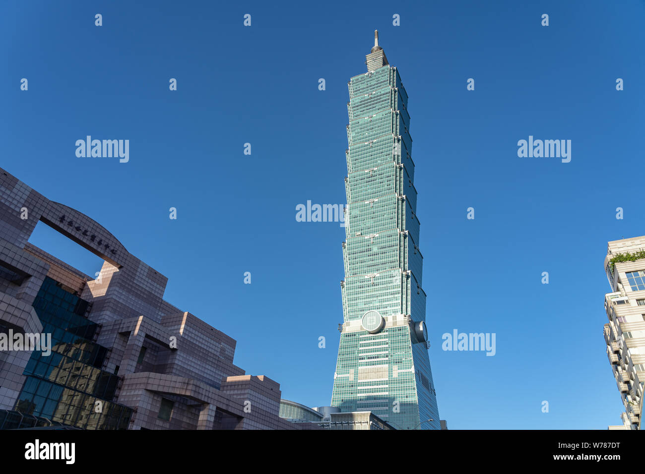Taipei 101 skyscraper building close up view over dark blue sky ...