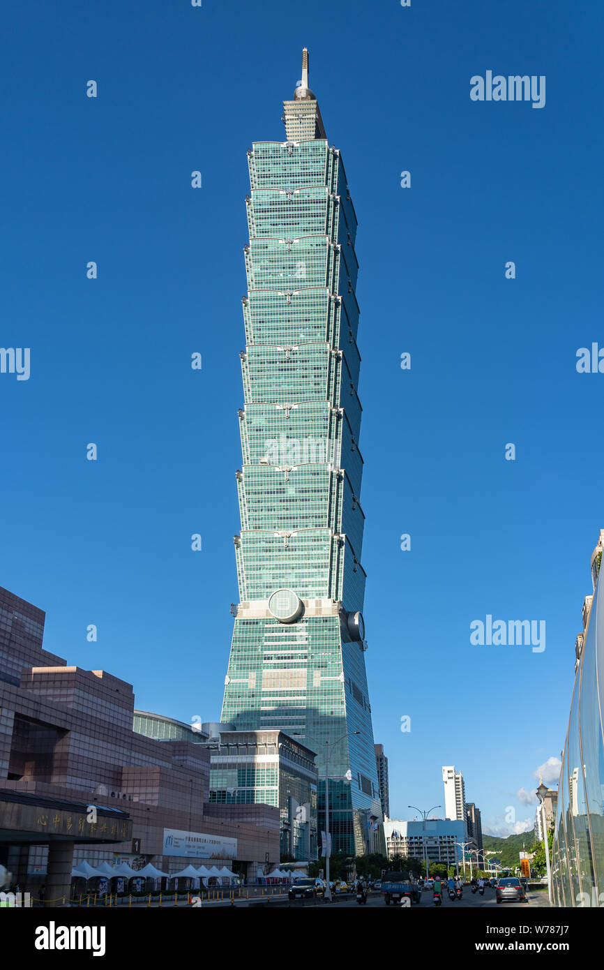 Taipei 101 skyscraper building close up view over dark blue sky ...