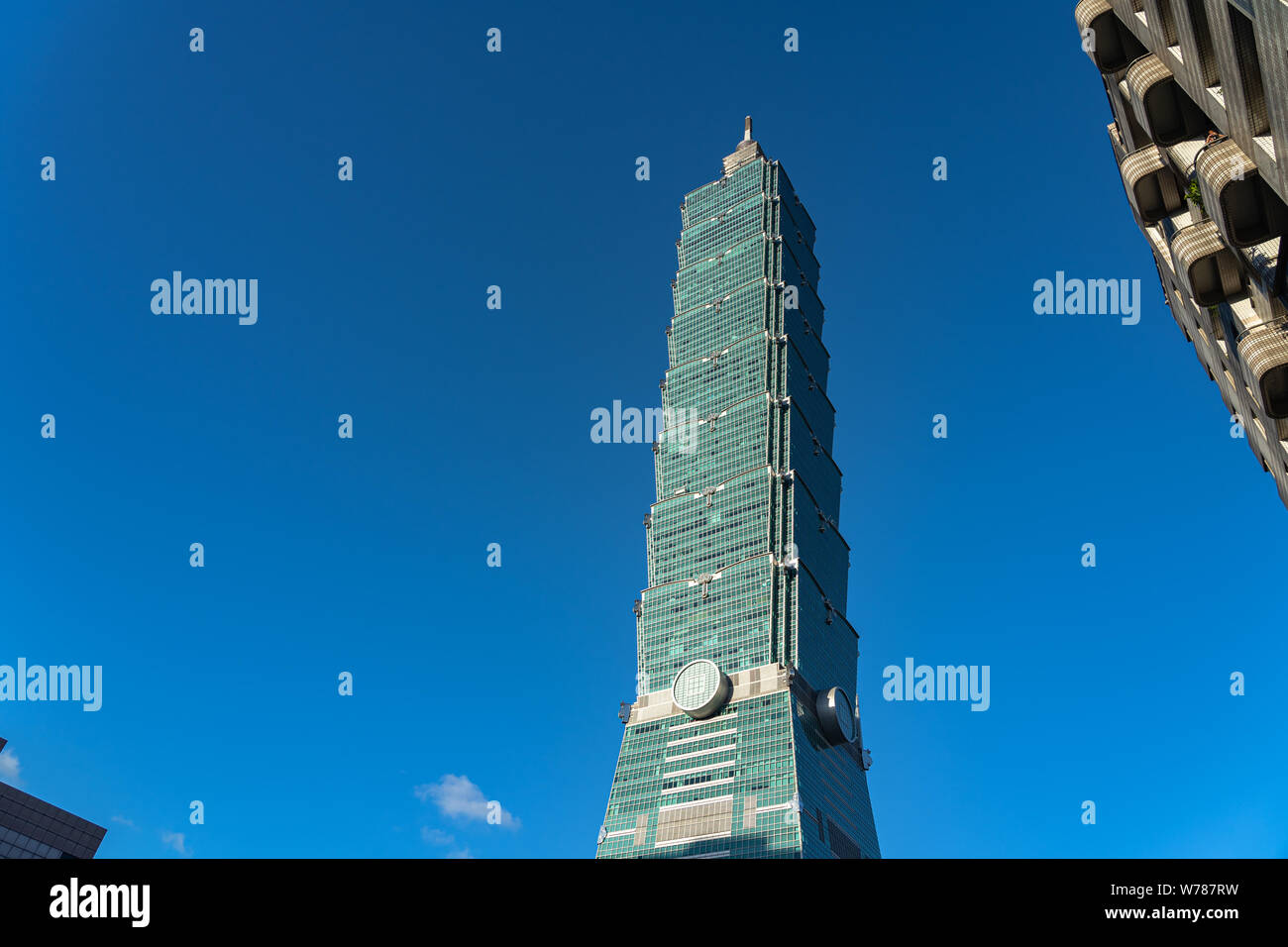 Taipei 101 skyscraper building close up view over dark blue sky ...