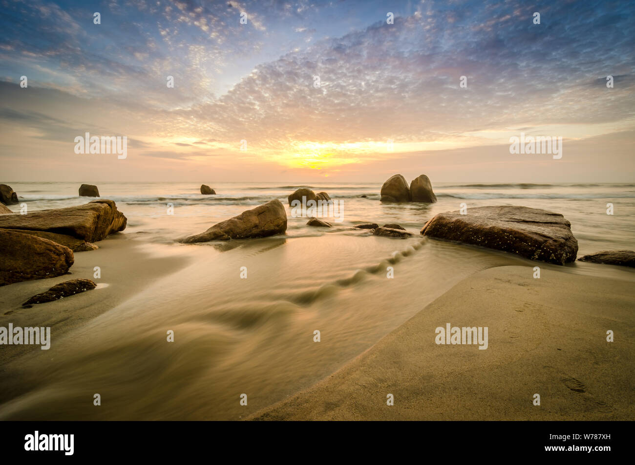 Beauty landscape with sun rising over sea Stock Photo - Alamy