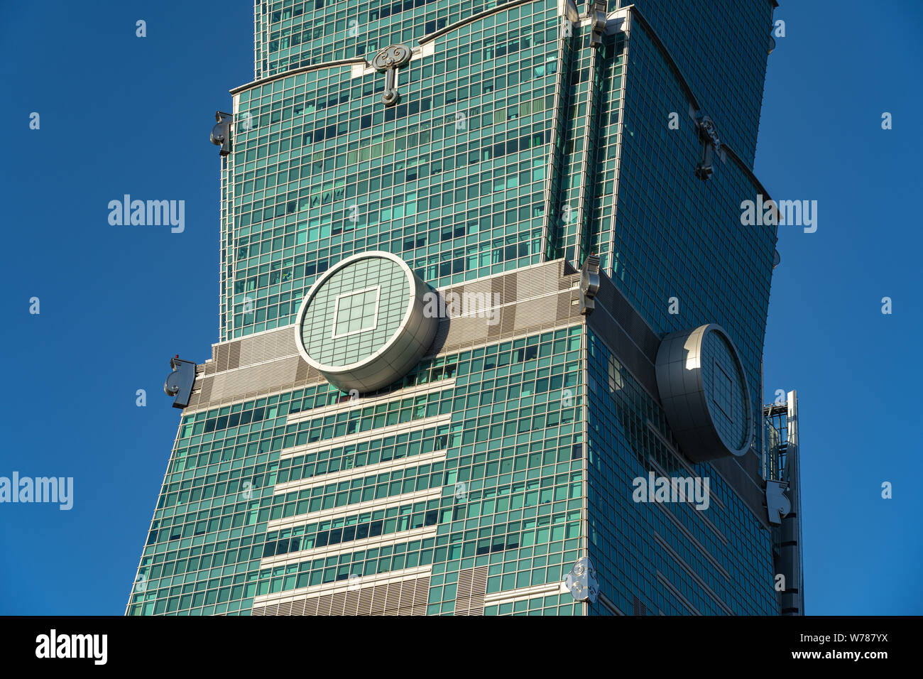 Taipei 101 skyscraper building close up view over dark blue sky ...