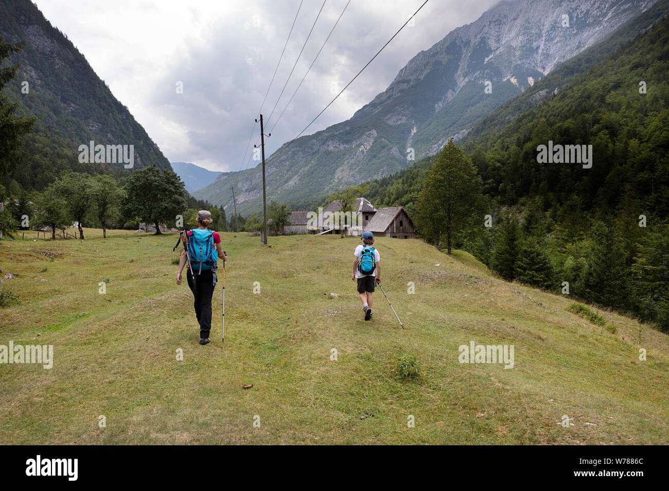 Mother and son (9-10) hiking on Soca trail in Soca valley, Bovec ...