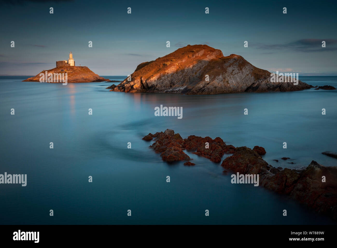 Mumbles Lighthouse at dusk Stock Photo - Alamy