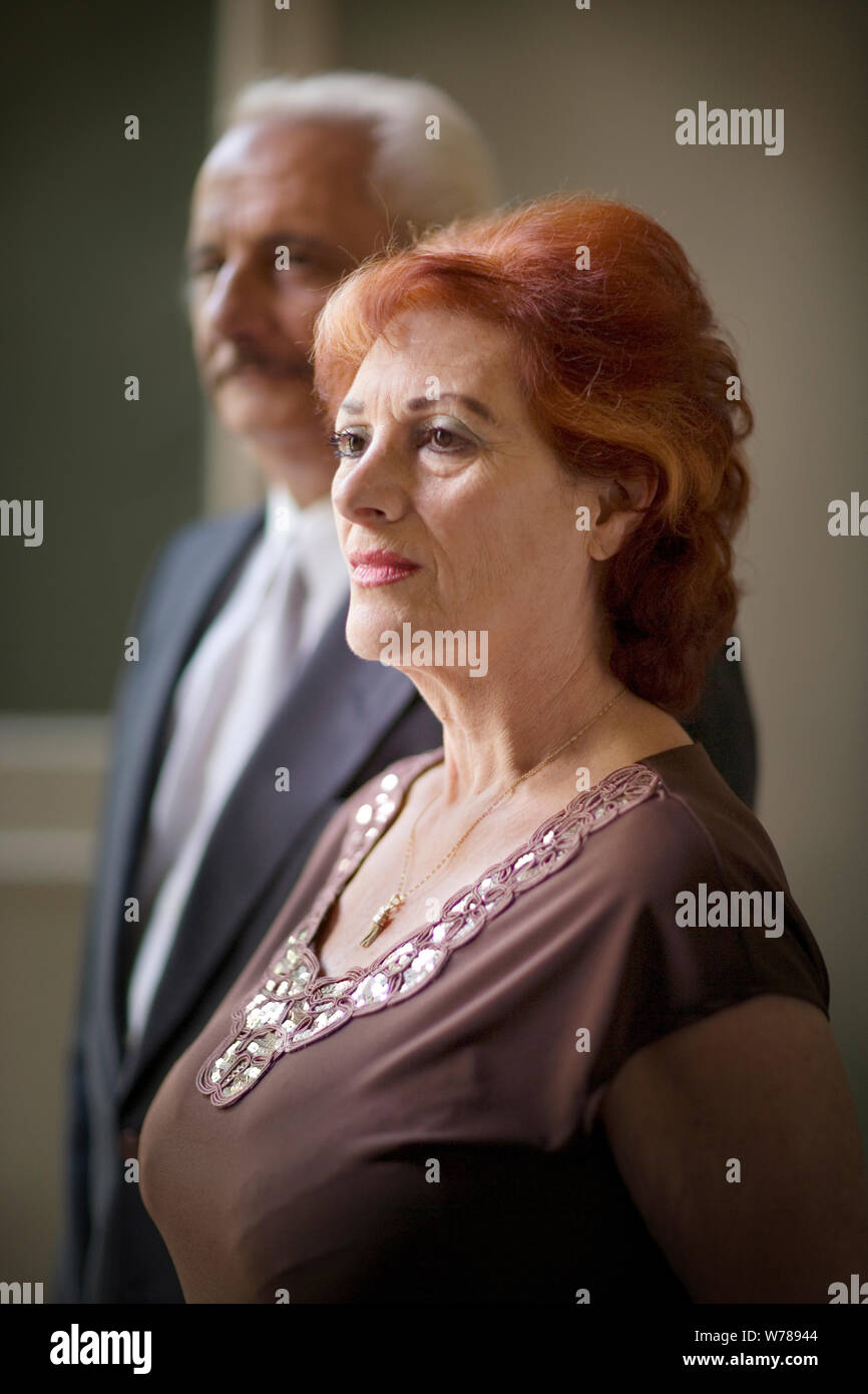 Side view of a couple standing Stock Photo - Alamy