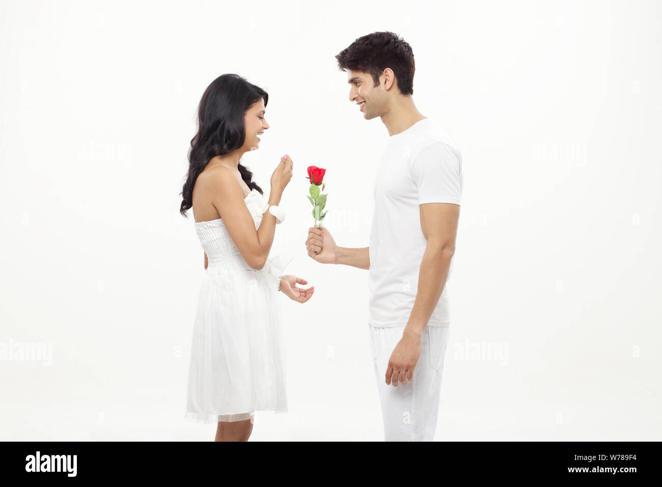 Man offering rose girlfriend hi-res stock photography and images - Alamy