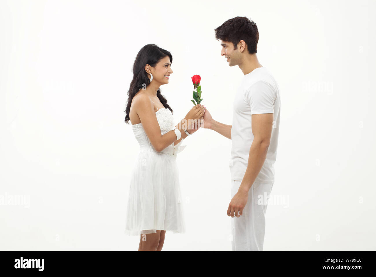 Husband giving wife rose in hi-res stock photography and images - Alamy