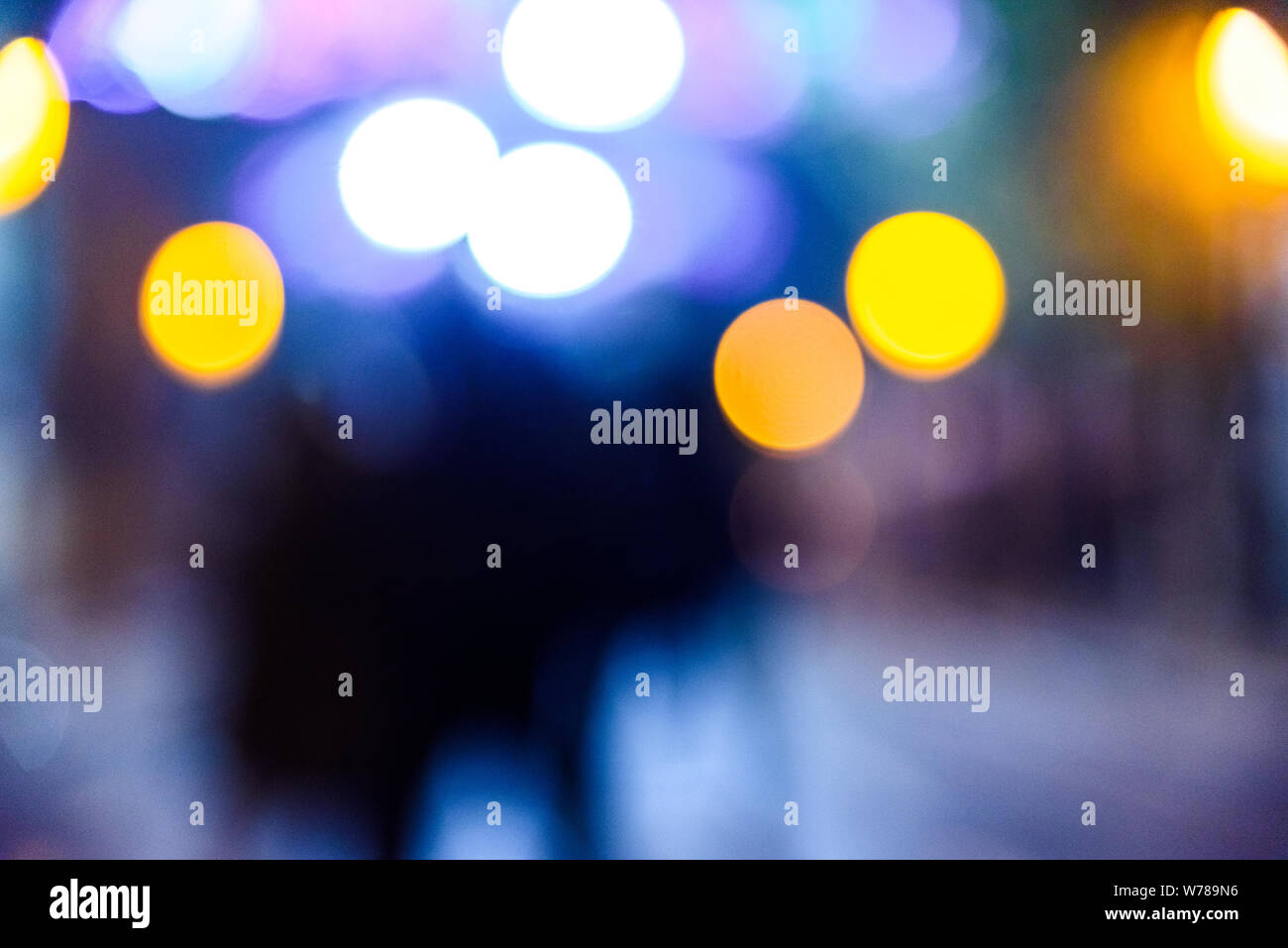 Defocused urban night background with colorful circles Stock Photo - Alamy