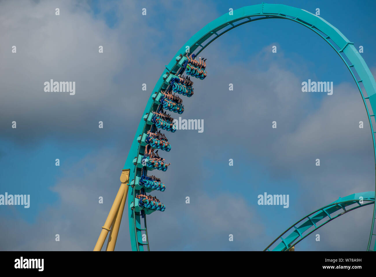 Orlando, Florida. July 29, 2019. People having fun Kraken rollercoaster ...