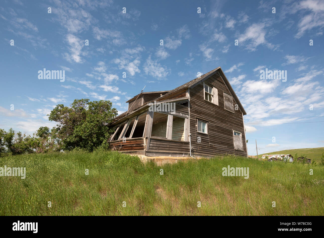 Abandoned farmhouse on the open prairie in southern Saskatchewan Stock ...