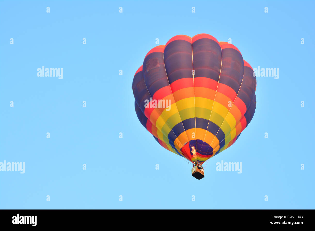 Colorful Hot Air Balloons in Flight over blue sky Stock Photo - Alamy
