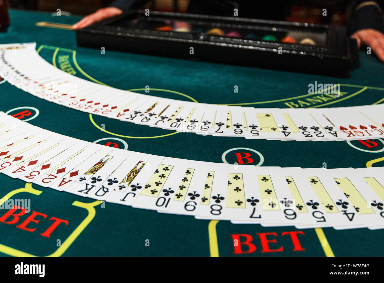 Professional croupier during cards Stock Photo - Alamy