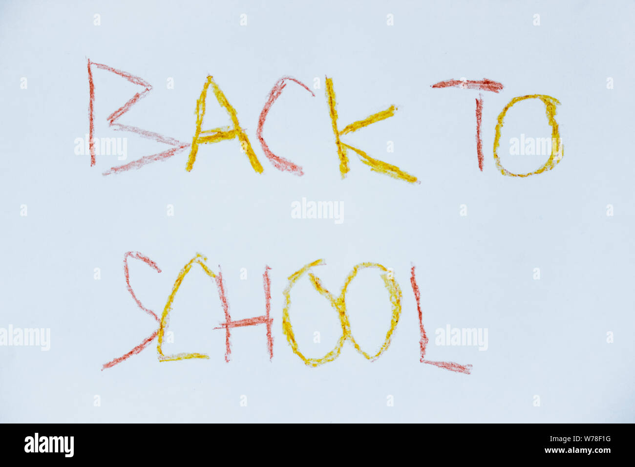 Sign Back to School hand written by a pupil. Children handwriting. Red ...