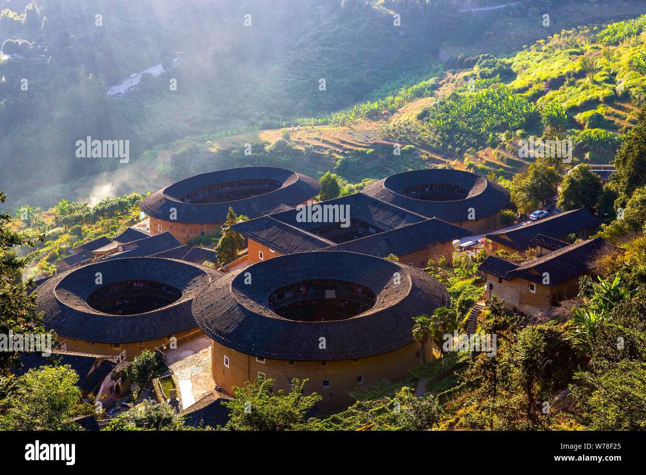 --FILE--Aerial view of the Tianluokeng tulou cluster in Nanjing county ...