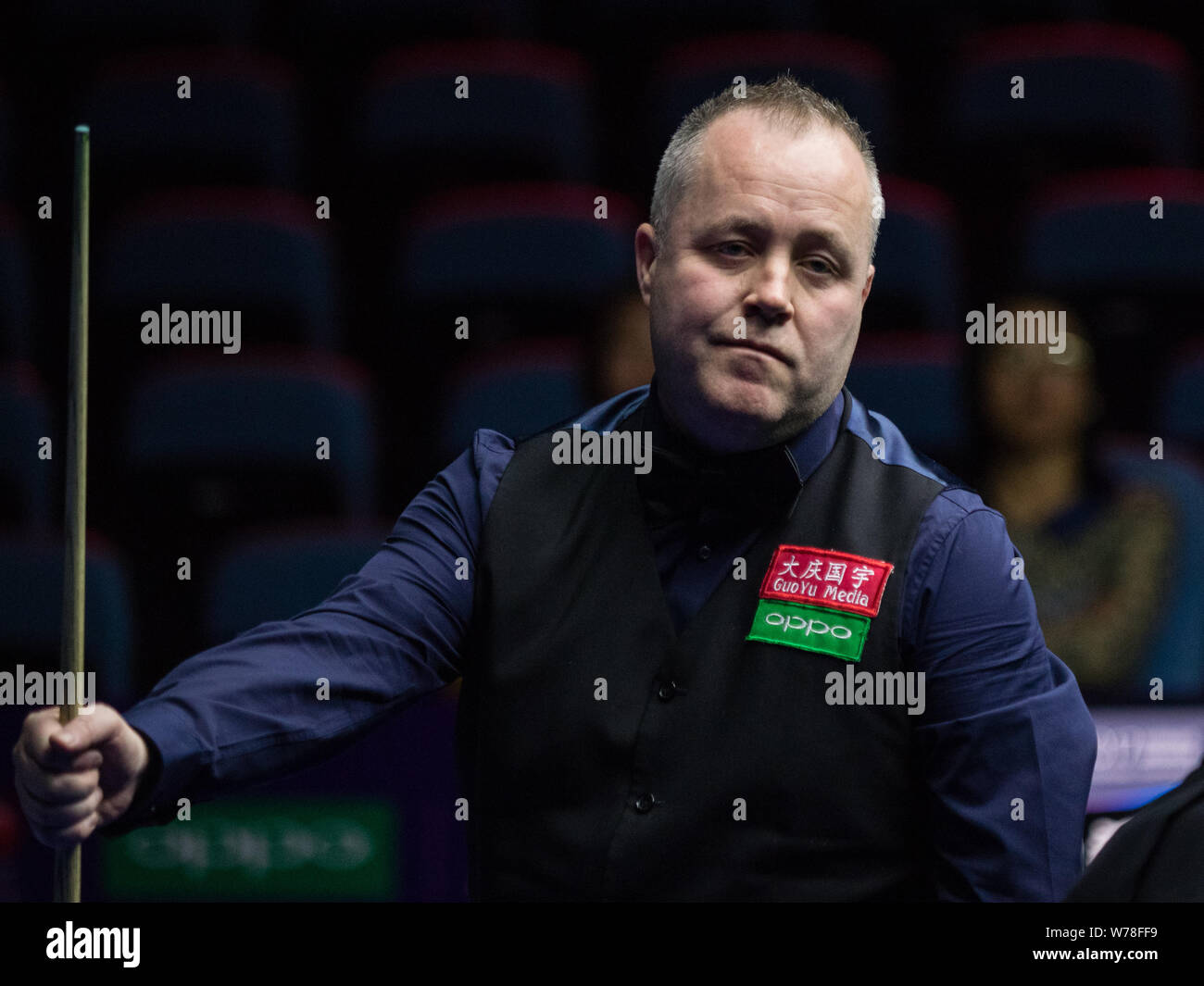 John Higgins of Scotland considers a shot to Mark Joyce of England in ...