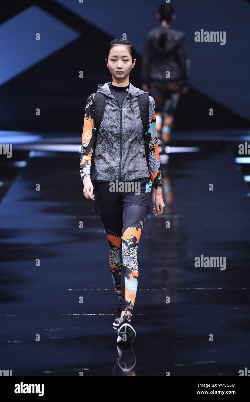 A model displays a new creation at the fashion show of XIANG SHANG SPORT by Huang Jieming during ...