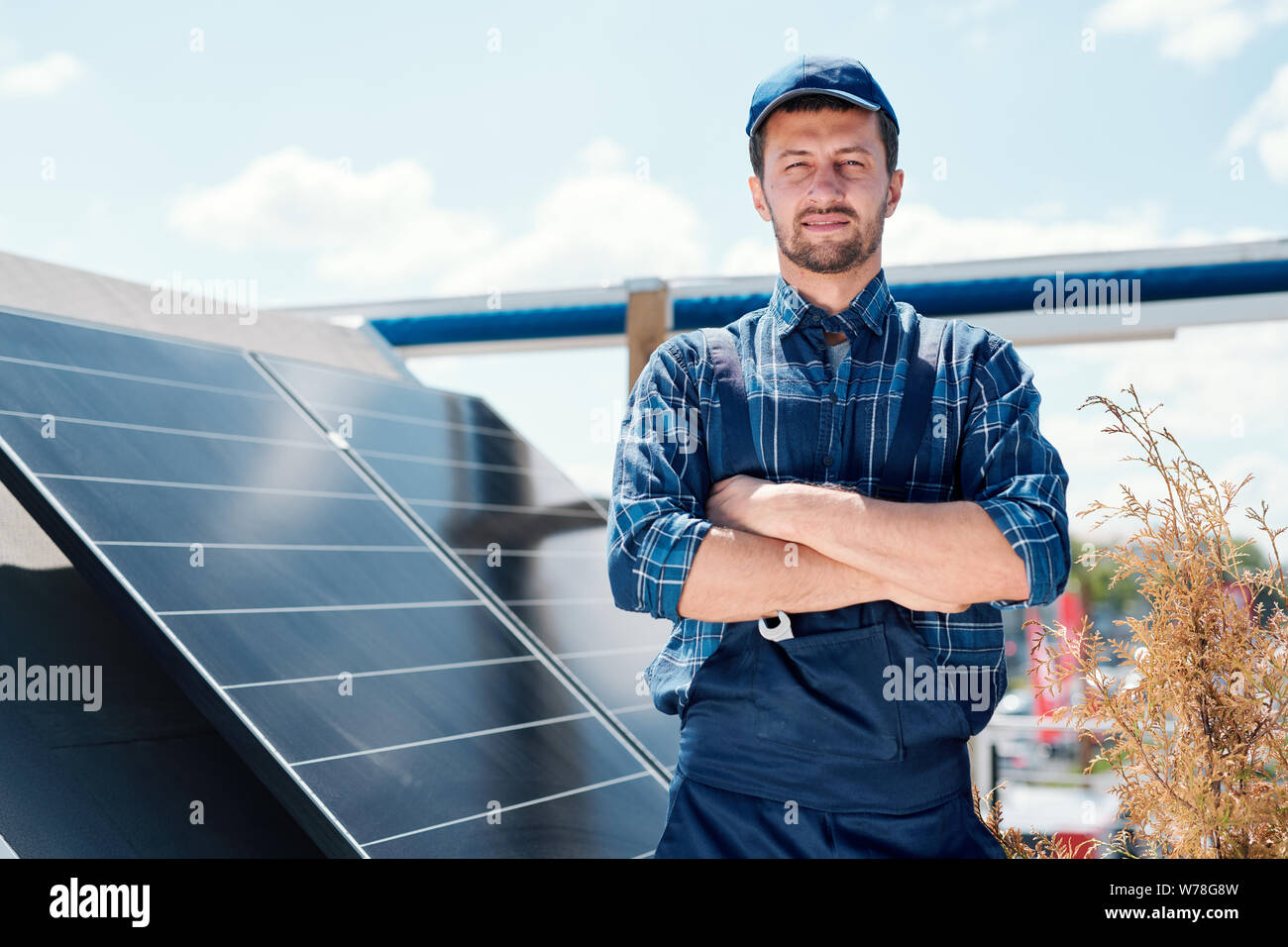 Young successful master of solar panel installation Stock Photo - Alamy