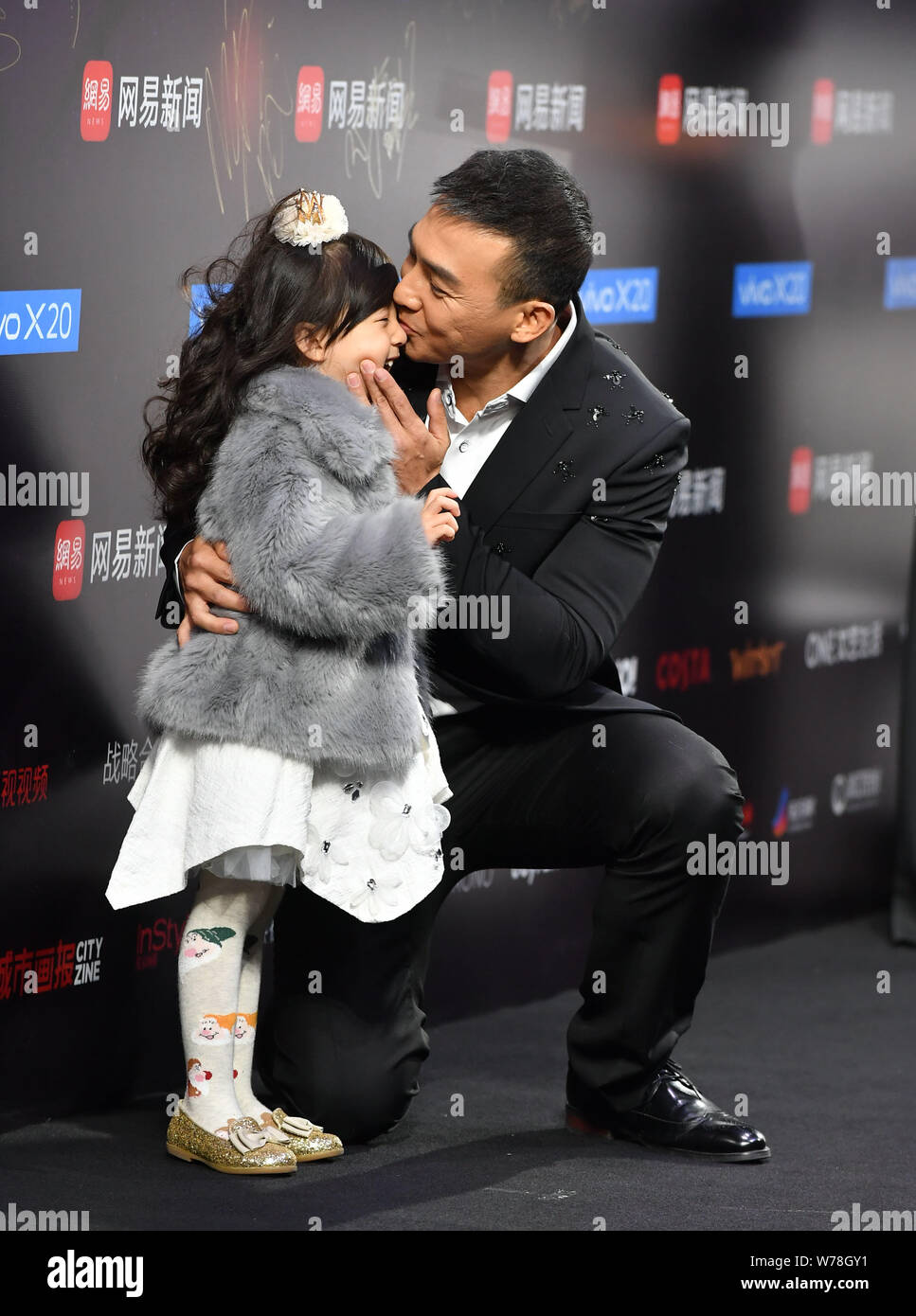 Taiwanese singer and actor Will Liu and his daughter Eve are pictured ...