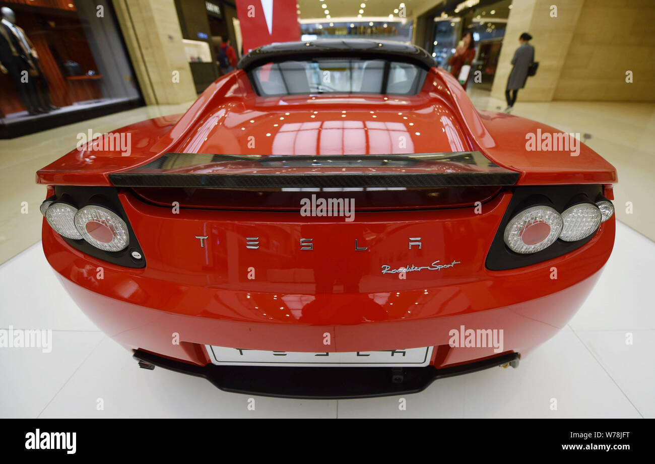 A Tesla Roadster, a battery electric vehicle (BEV) sports car of Tesla ...