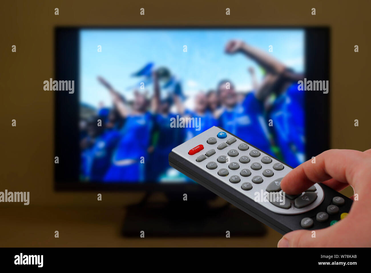 Football match winner team celebrating with the cup in television, with ...