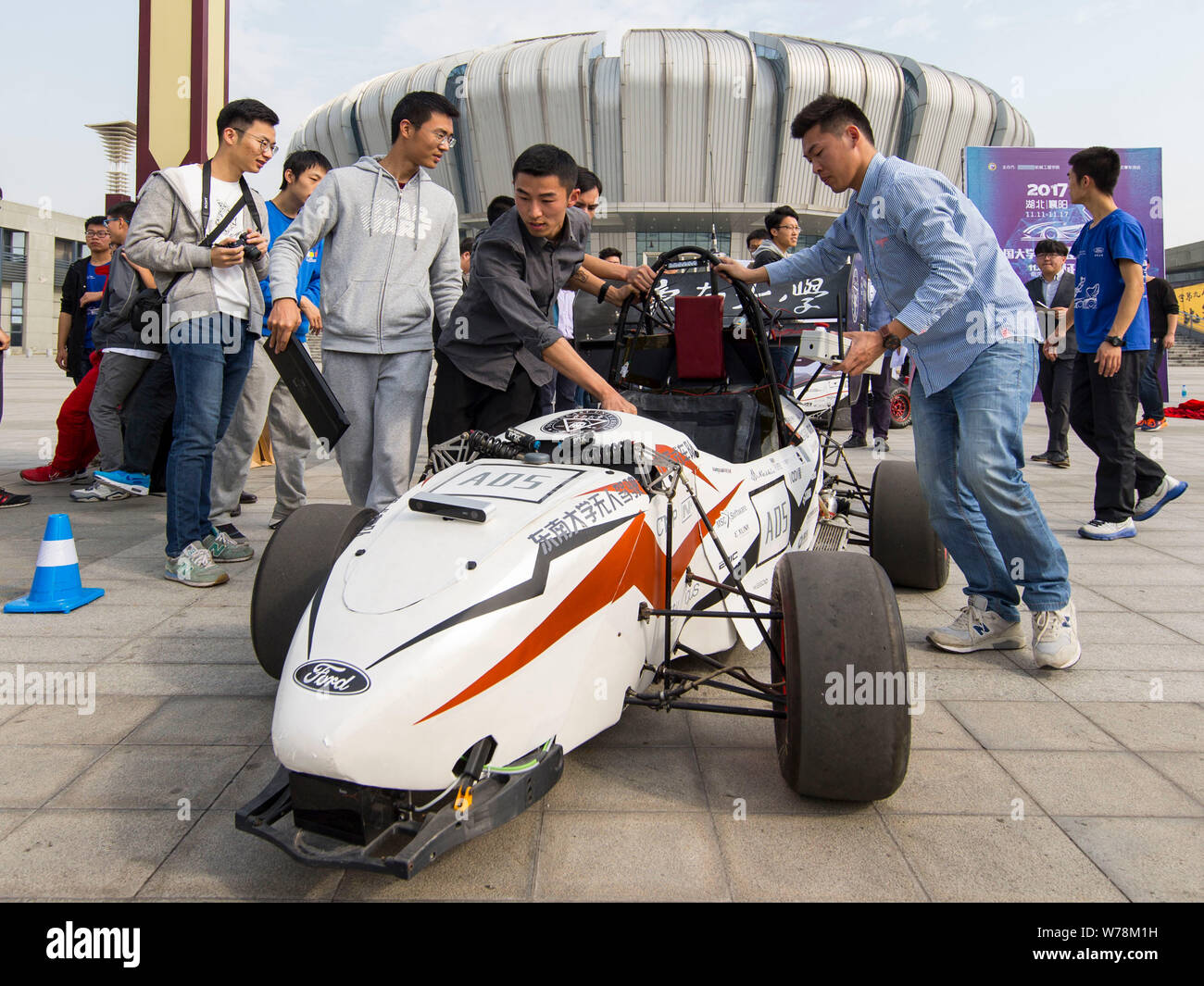 Students of Southeast University (SEU) Racing Team display the first ...