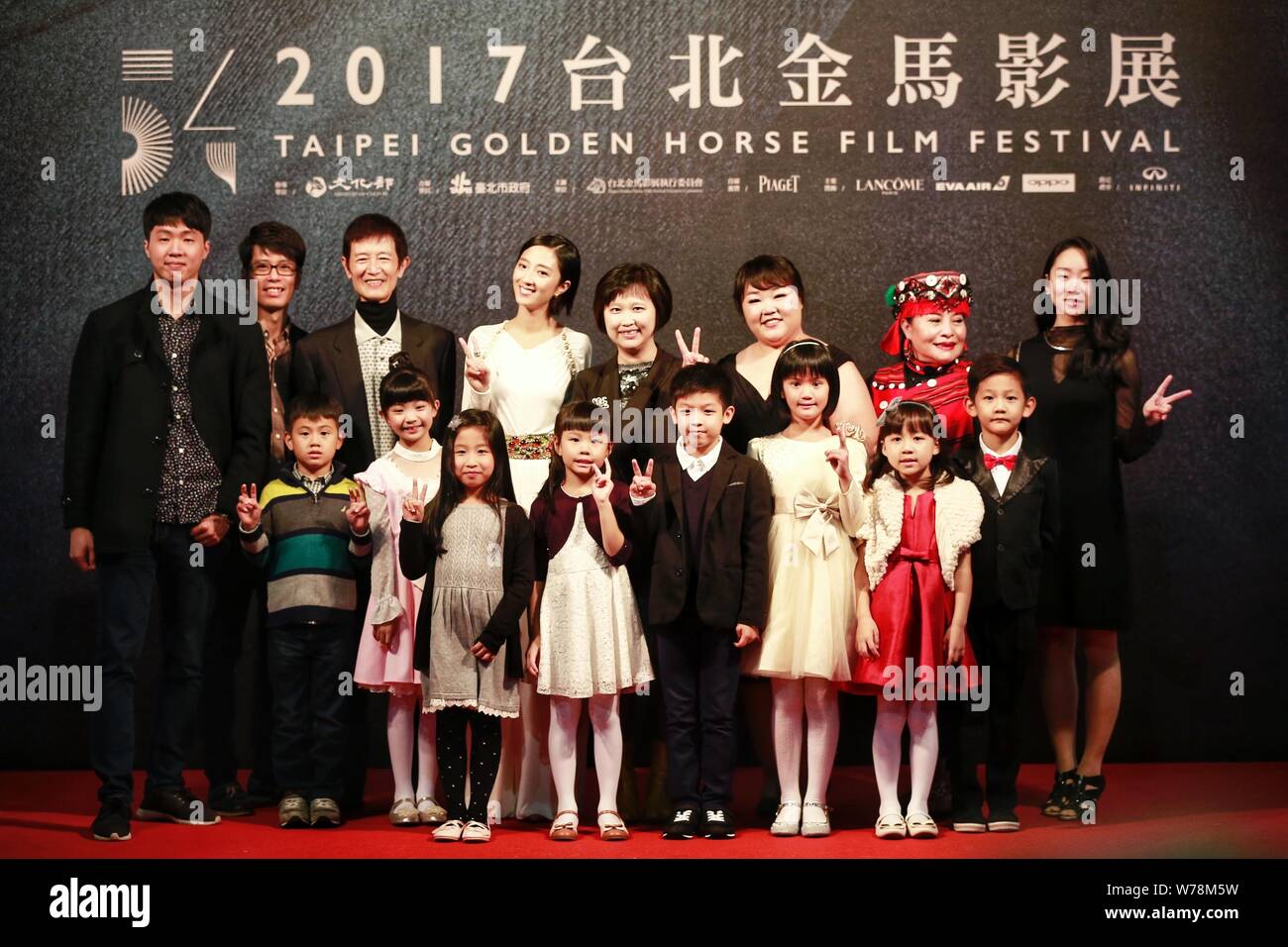 Taiwanese actress Gwei Lun-mei, back fourth left, poses as she arrives ... Taiwanese actress Gwei Lun-mei, back fourth left, poses as she arrives ...