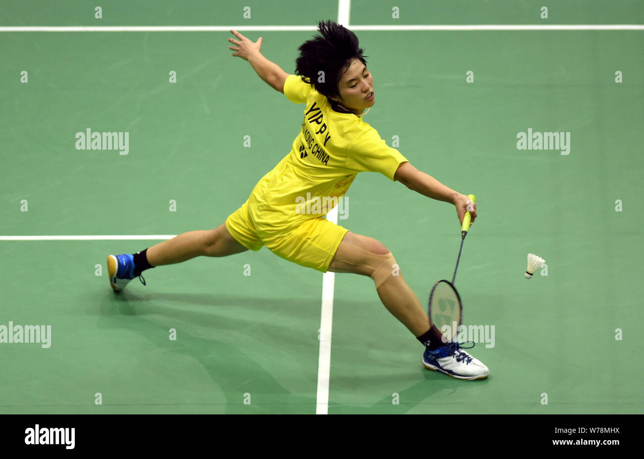 Yip Pui Yin of Hong Kong returns a shot to Sung Ji-hyun of South Korea ...