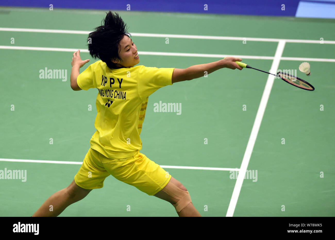 Yip Pui Yin of Hong Kong returns a shot to Sung Ji-hyun of South Korea ...