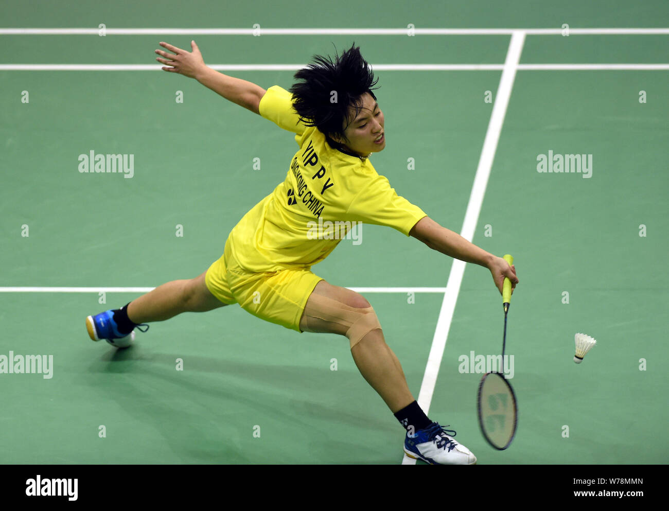 Yip Pui Yin of Hong Kong returns a shot to Sung Ji-hyun of South Korea ...