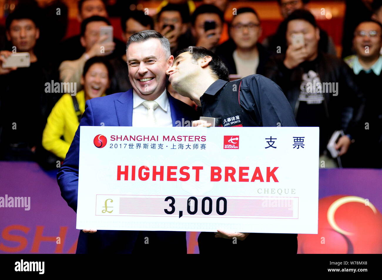 Ronnie O'Sullivan of England, right, kisses Jason Ferguson, the ...