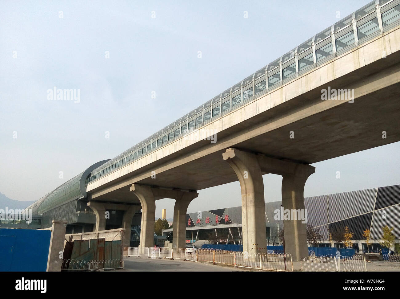 A metro train runs on the Yanfang Line, the China's first fully ...
