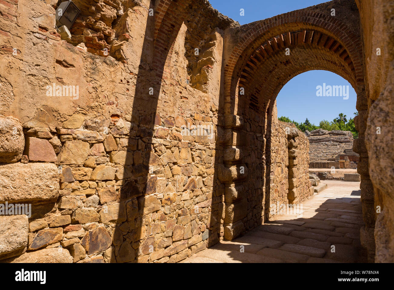 Exit gateway with arches of Roman Amphitheater, at the huge ...