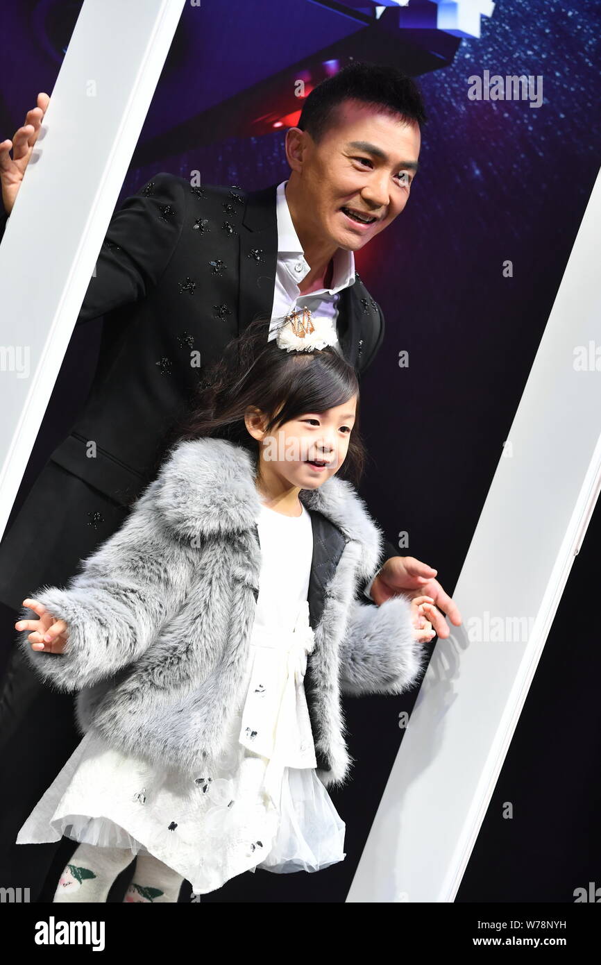 Taiwanese singer and actor Will Liu and his daughter Eve are pictured ...