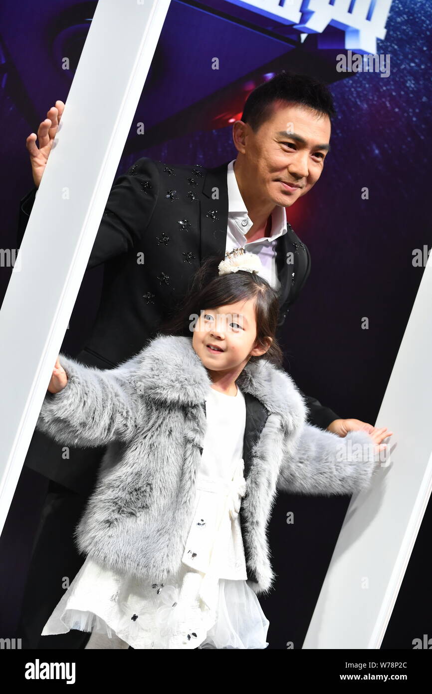 Taiwanese singer and actor Will Liu and his daughter Eve are pictured ...