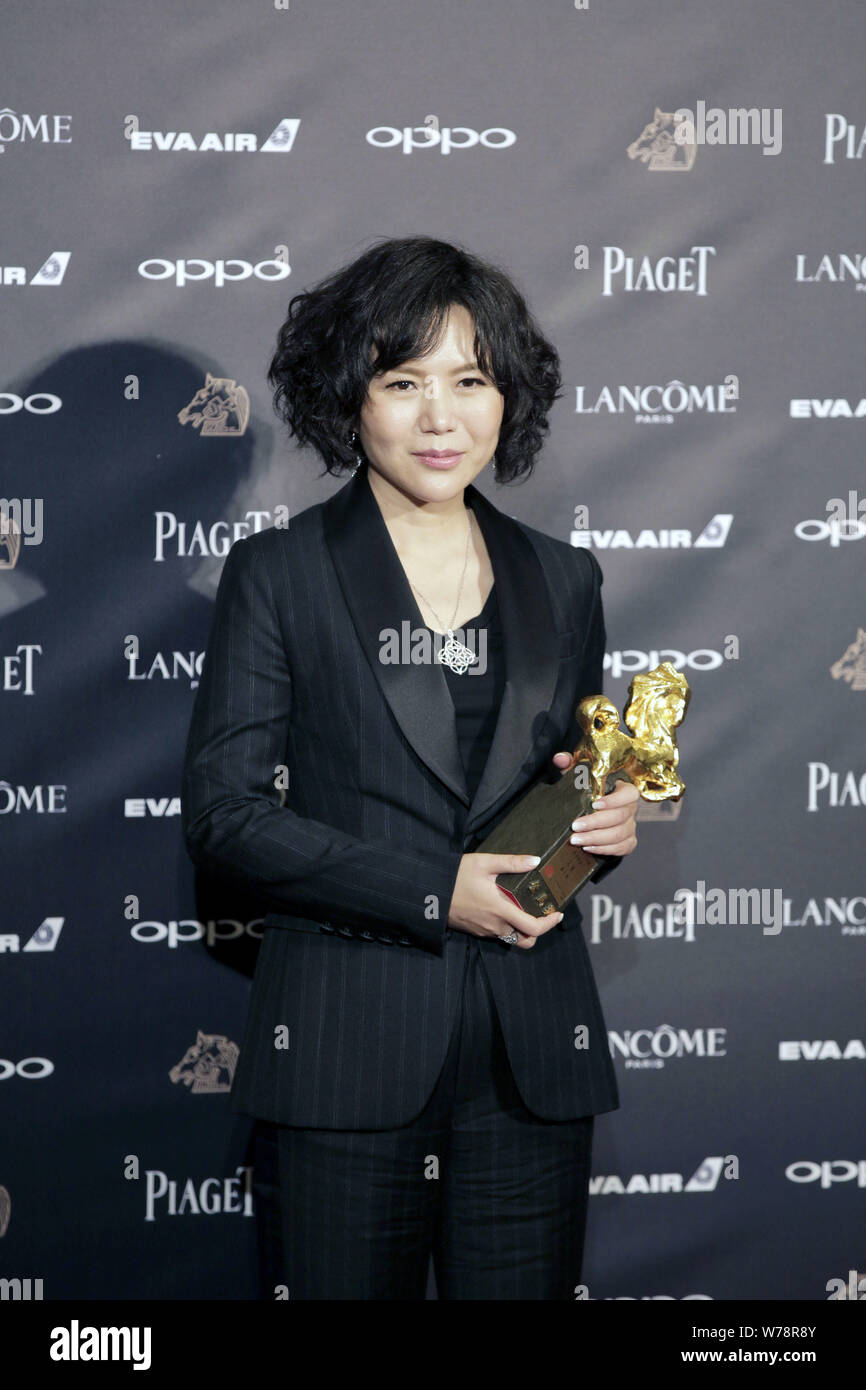Chinese director Vivian Qu or Wen Yan poses with her trophy of the Best ...