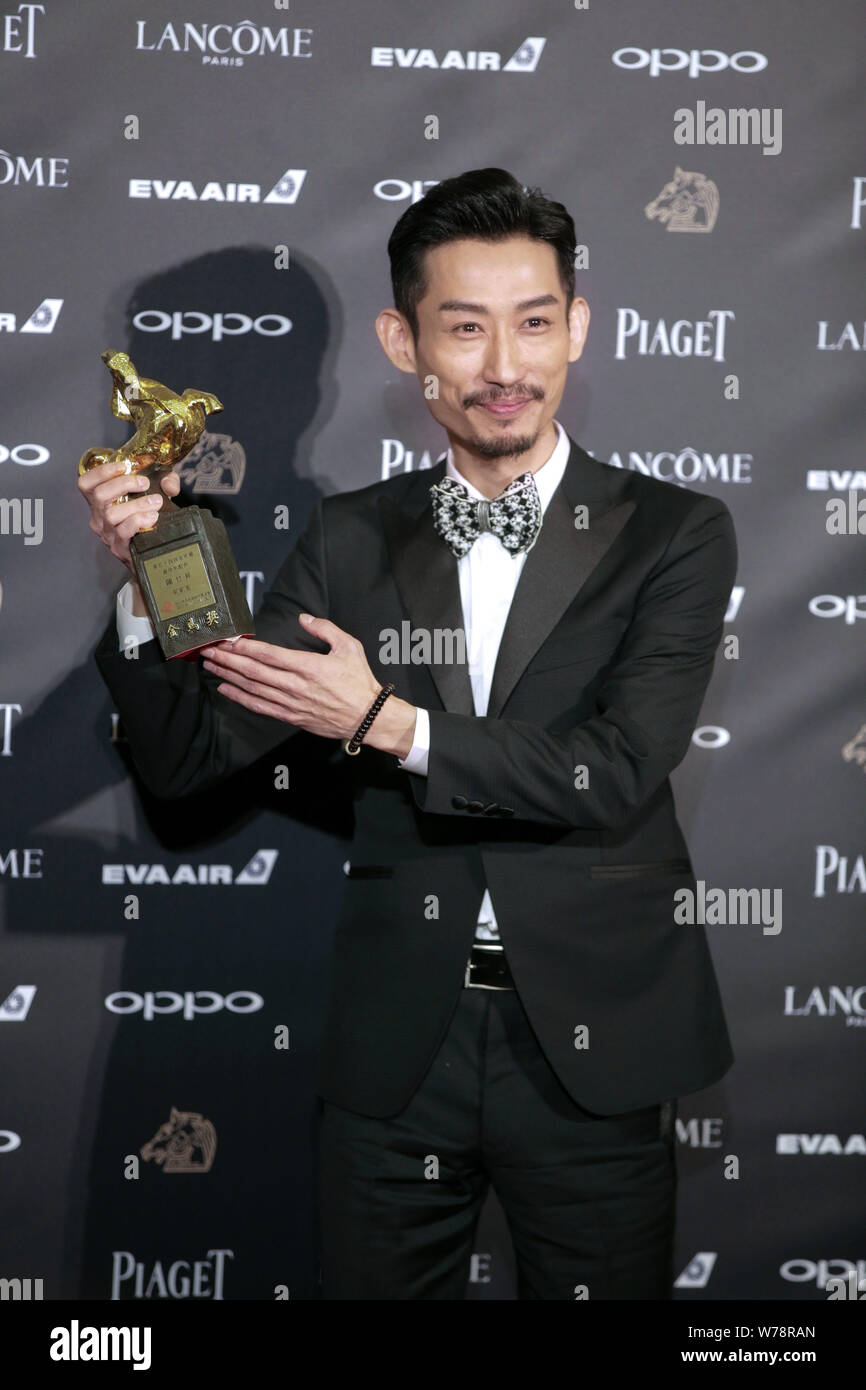 Taiwanese actor Chen Chu-sheng poses with his trophy of the Best ...