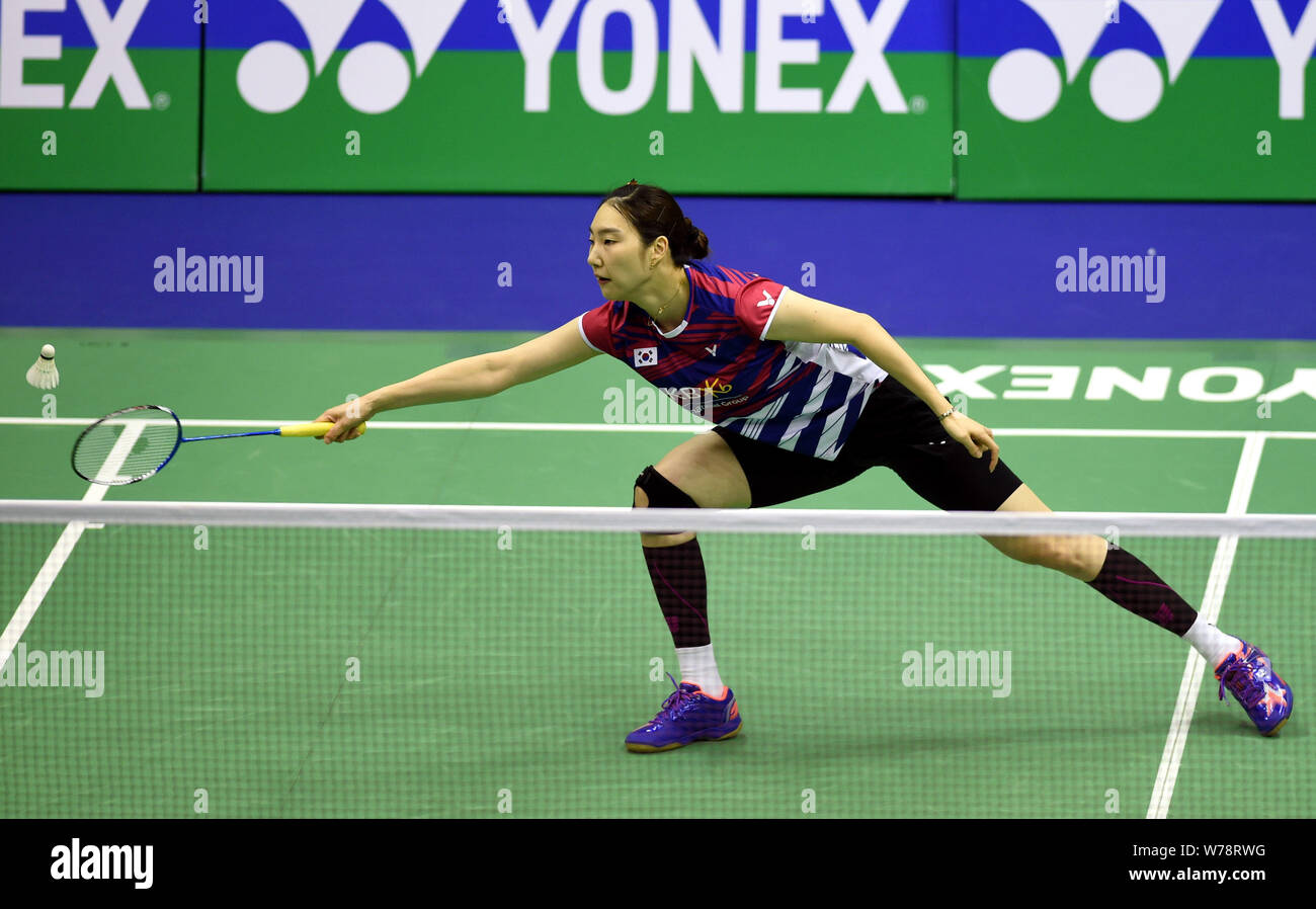 Sung Ji-hyun of South Korea returns a shot to Yip Pui Yin of Hong Kong ...
