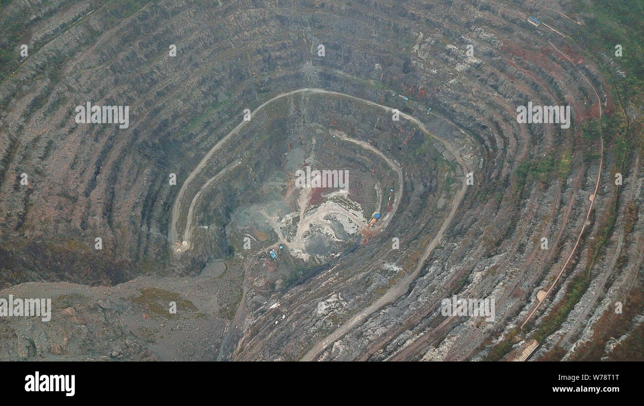 Aerial view of Asia's largest open-pit hole at Huangshi National Mine ...