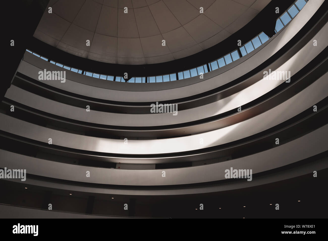 Close up photo of an orange and white rubber lifesaver float, standing ...