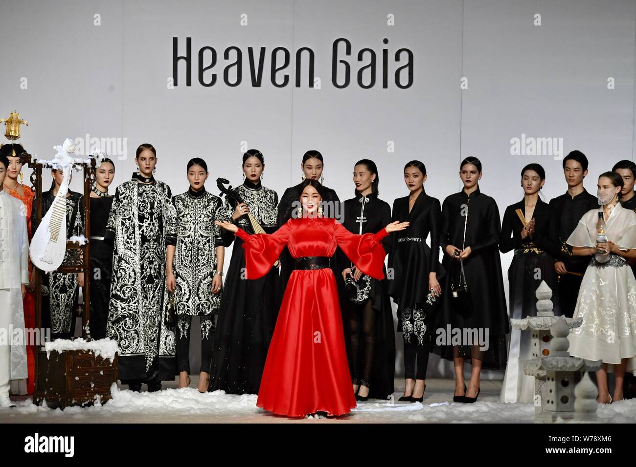Chinese fashion designer Xiong Ying poses at the fashion show of Heaven ...