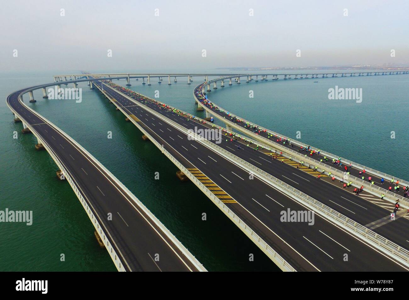 Participants compete in the world's first marathon on the sea on ...