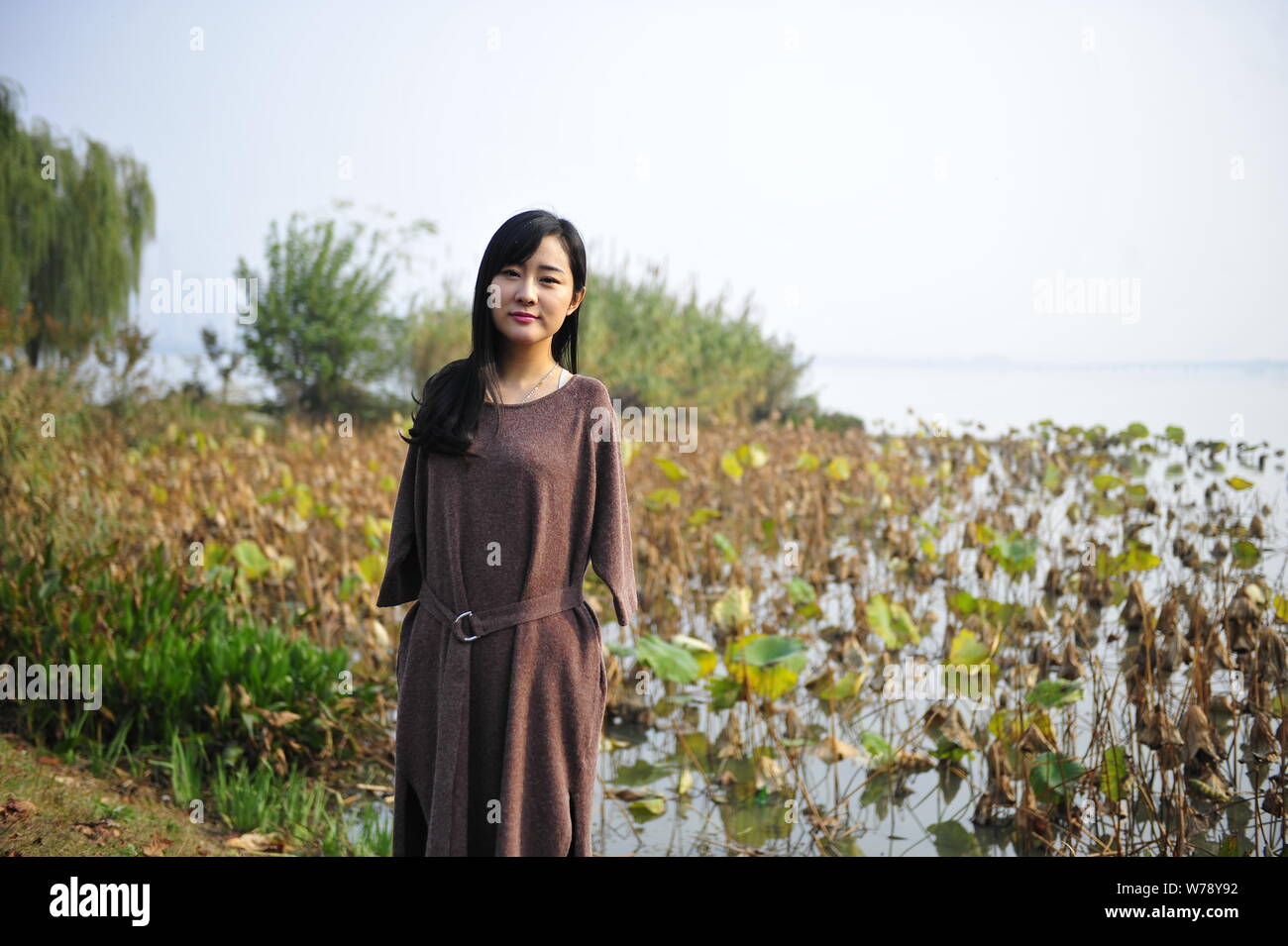 --FILE--Chinese handicapped girl Yang Li without her arms poses for ...