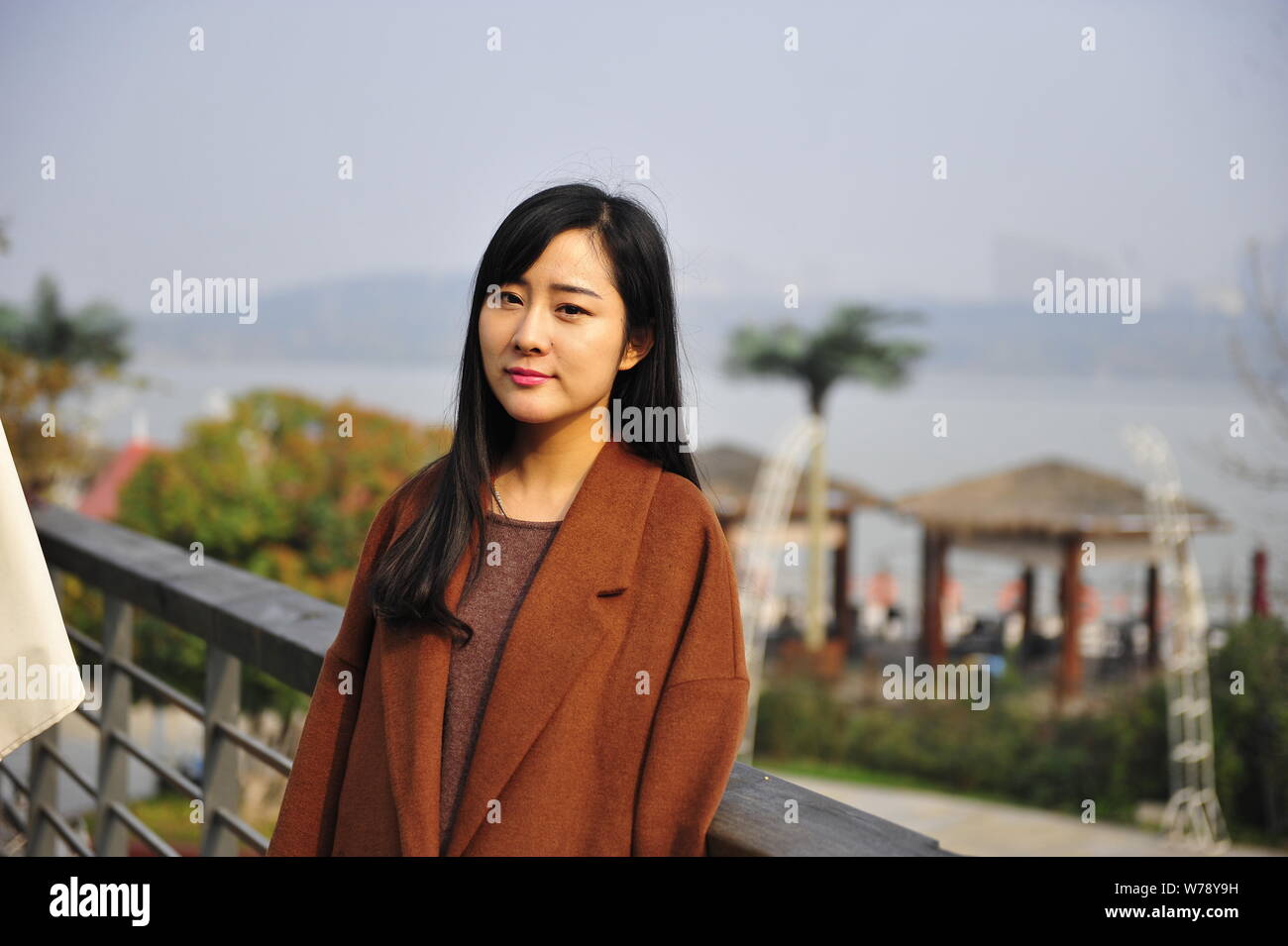 --FILE--Chinese handicapped girl Yang Li without her arms uses her toes ...