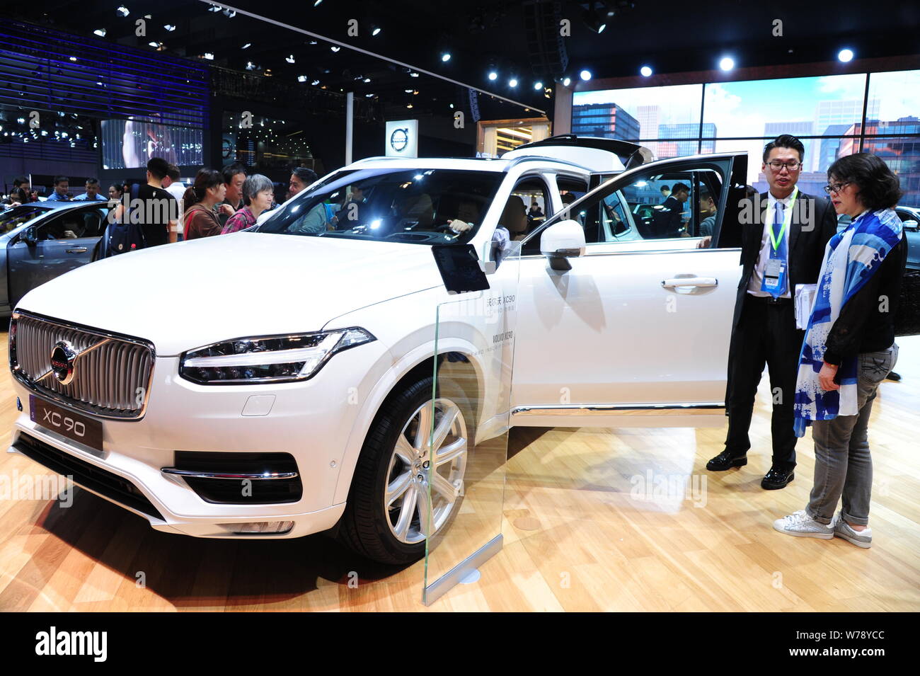 --FILE--Visitors try out a Volvo XC90 car during the 17th Shanghai ...