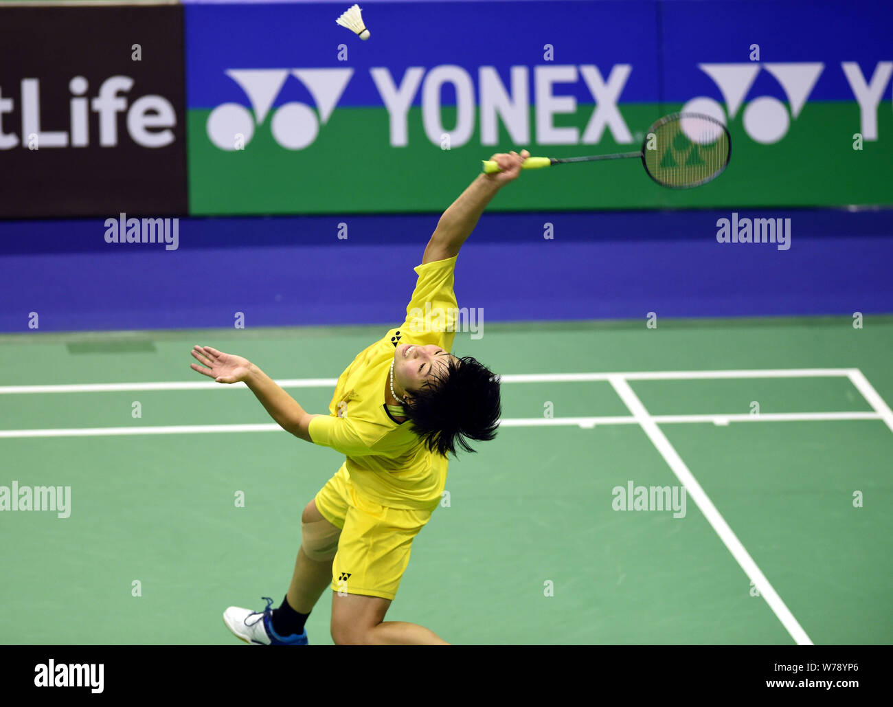Yip Pui Yin of Hong Kong serves against Sung Ji-hyun of South Korea in ...