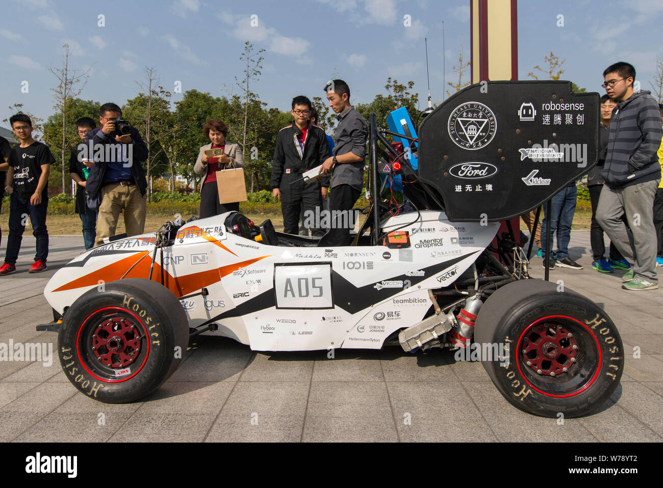 Students of Southeast University (SEU) Racing Team display the first ...