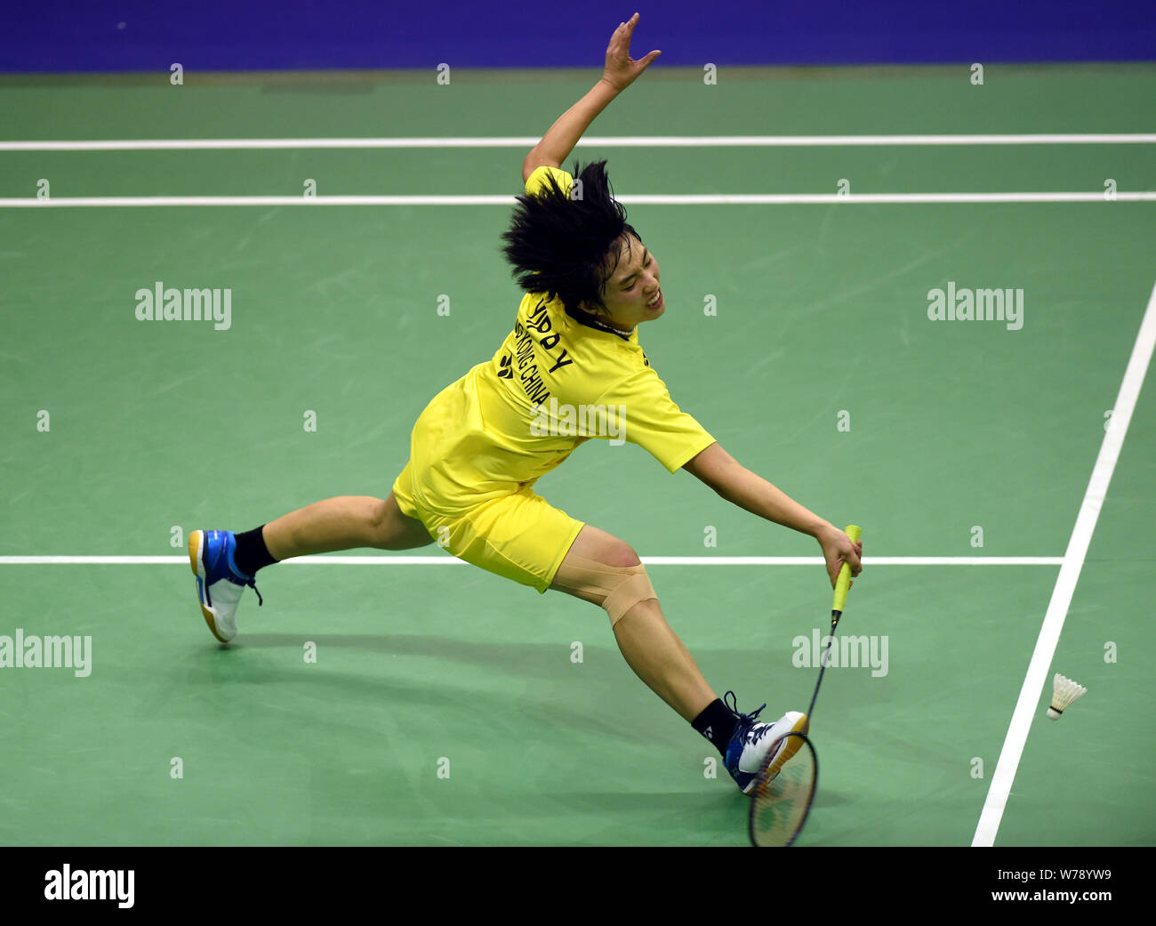 Yip Pui Yin of Hong Kong returns a shot to Sung Ji-hyun of South Korea ...