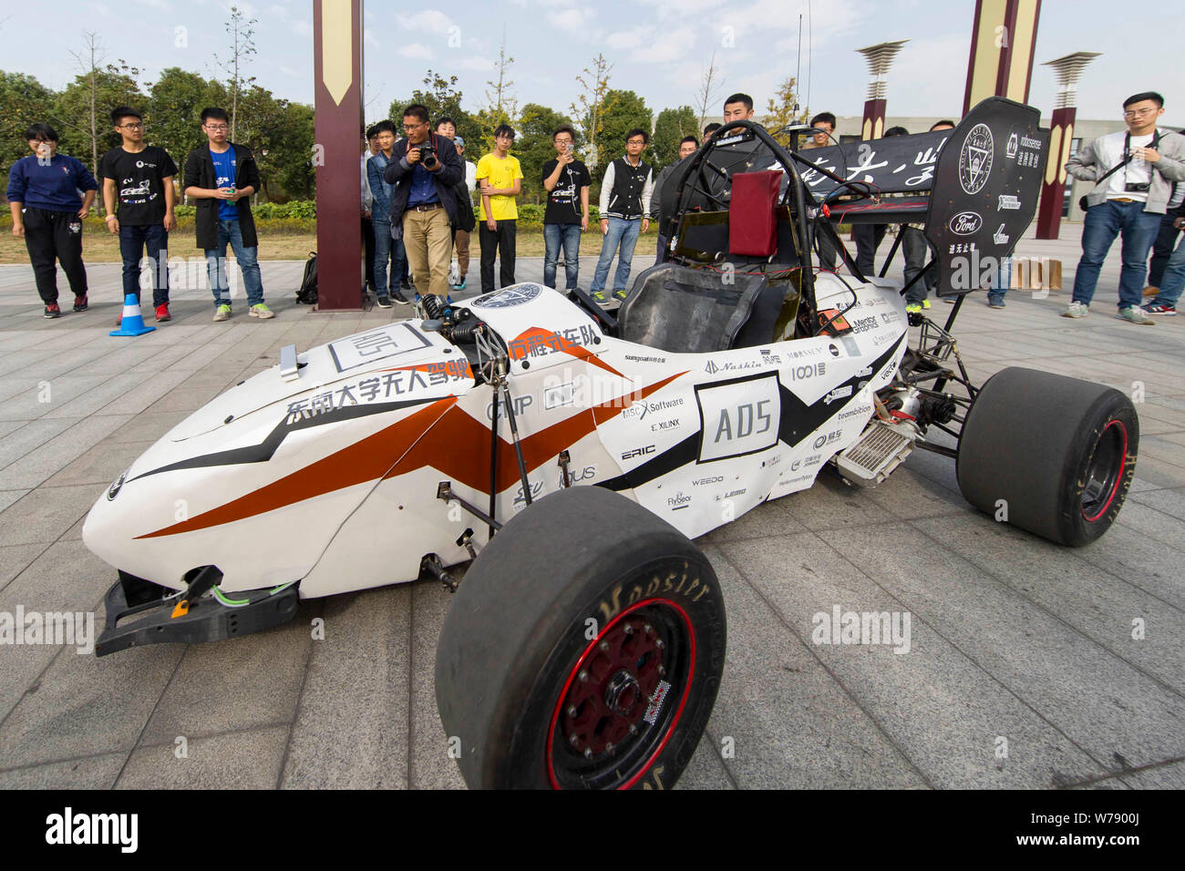 Students of Southeast University (SEU) Racing Team display the first ...