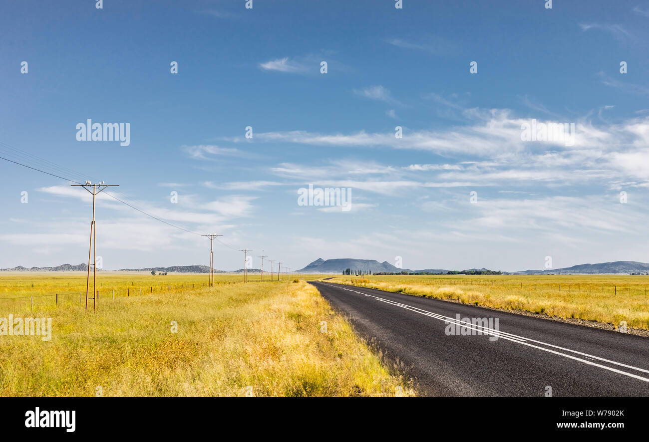 View of an empty country highway road in South African Farmland region ...