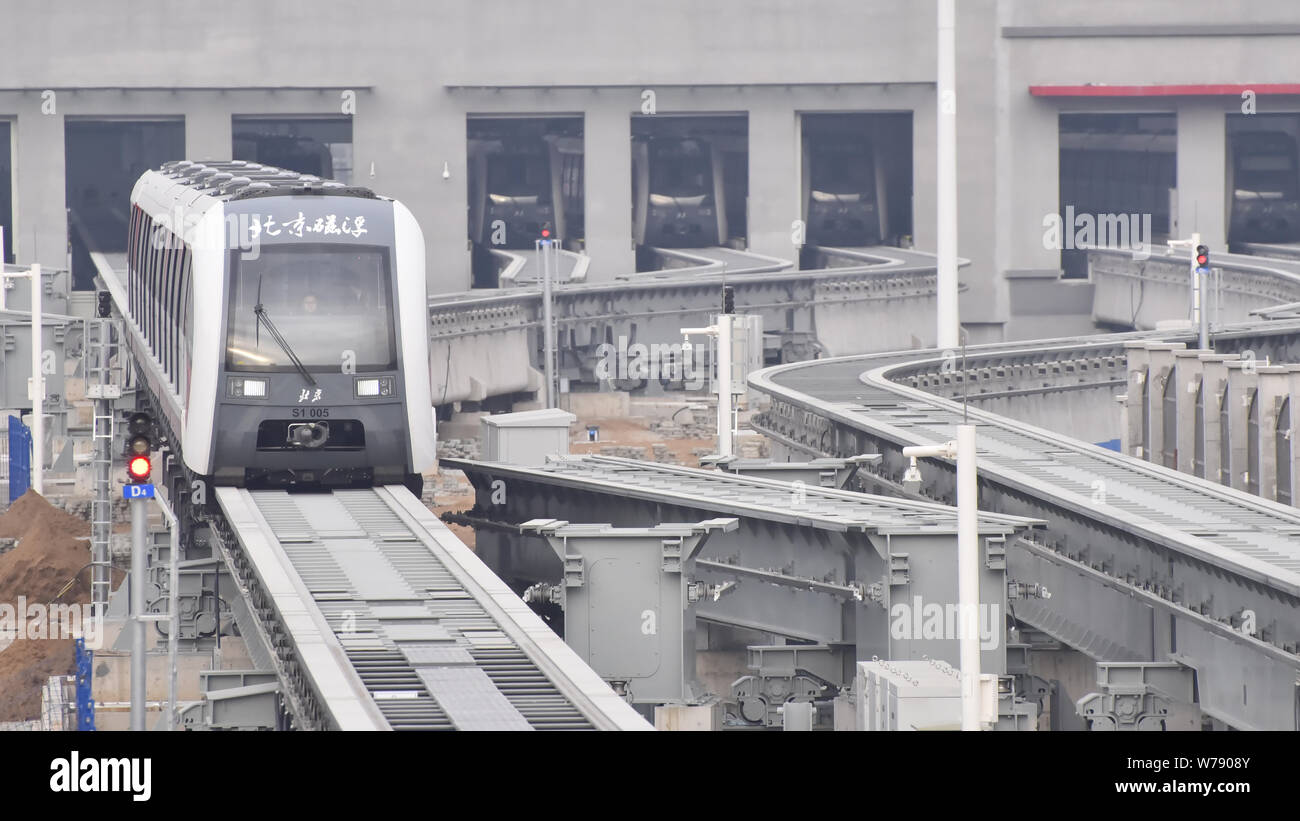 A maglev train runs on Beijing's first medium-low speed maglev S1 line ...