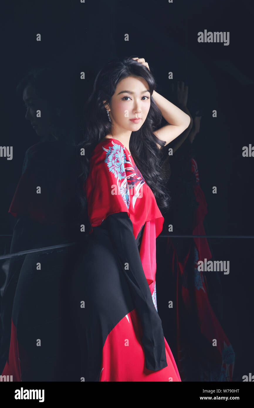 Hong Kong singer and actress Fiona Sit poses for photos during an ...